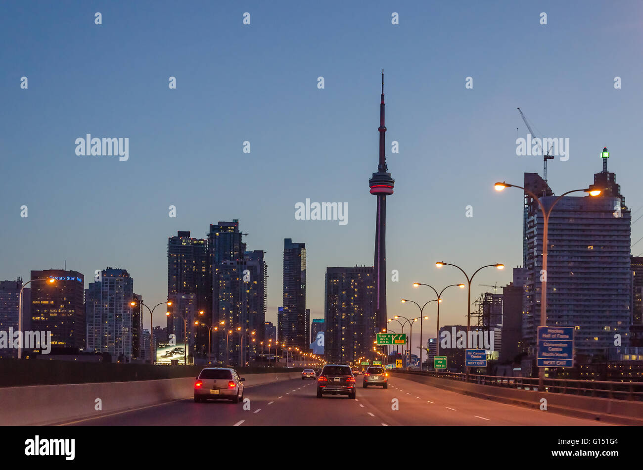 Toronto highway at night with cars. Toronto has a population of 6M and ...