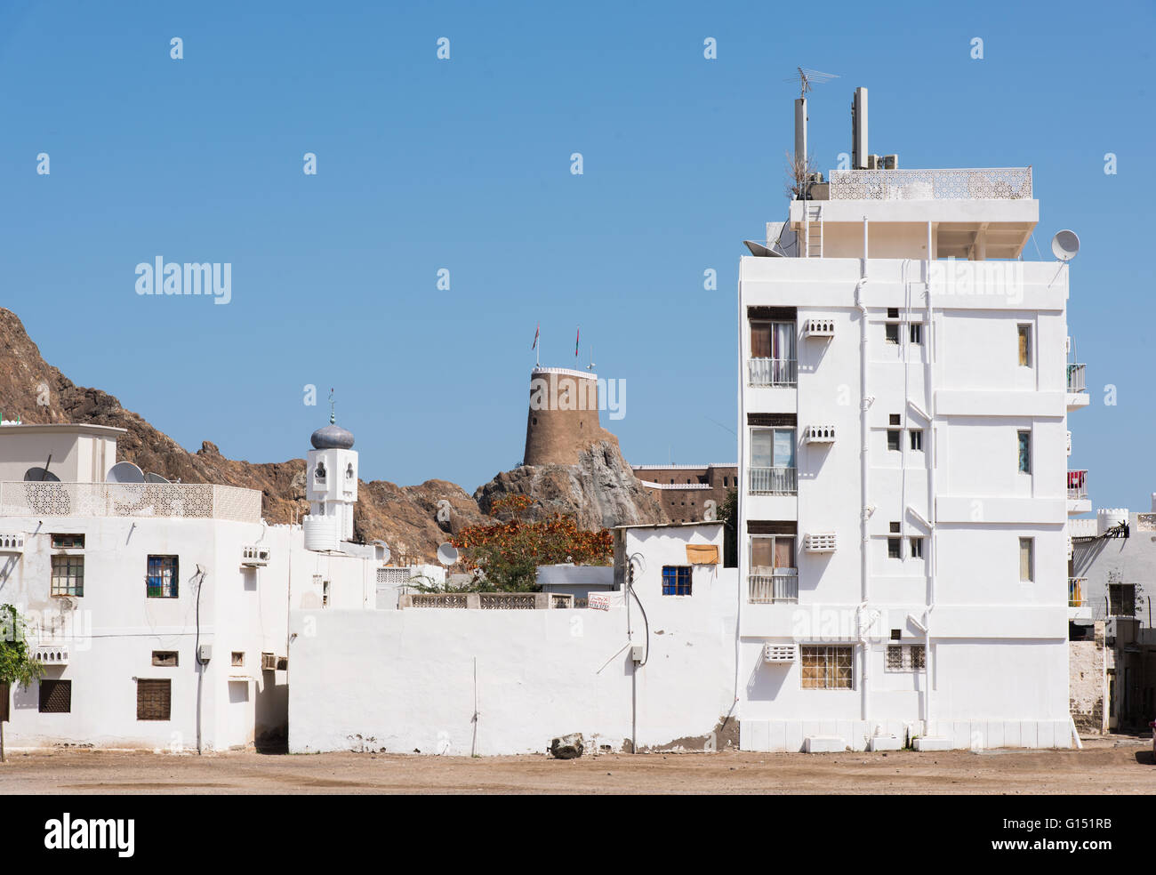 Residential area in Muscat, The Sultanate of Oman, with the ancient ...