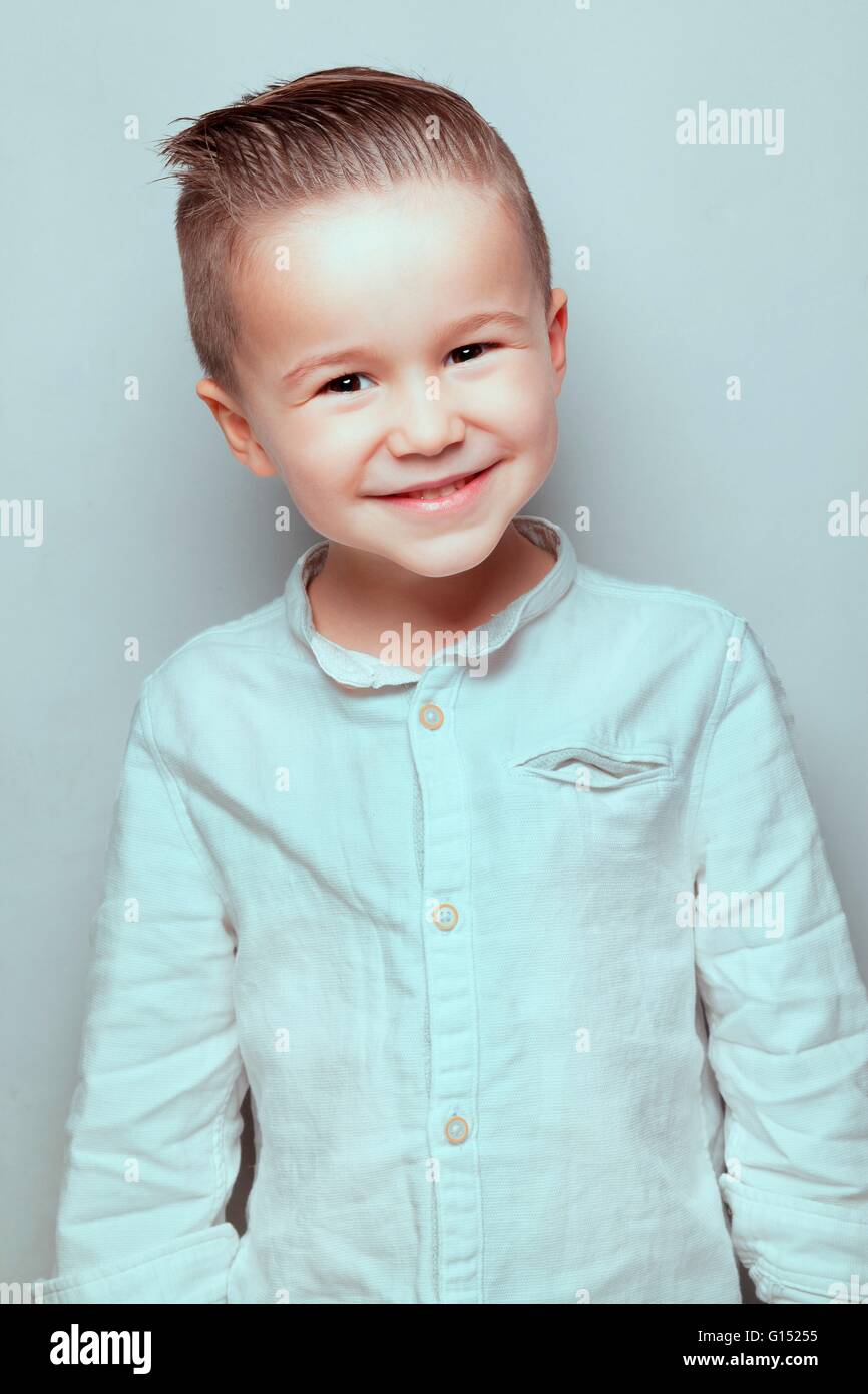 Portrait of a smiling boy Stock Photo - Alamy