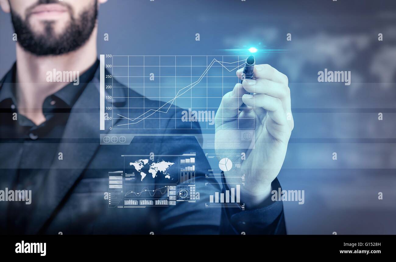 Young business man writing on a virtual screen Stock Photo - Alamy