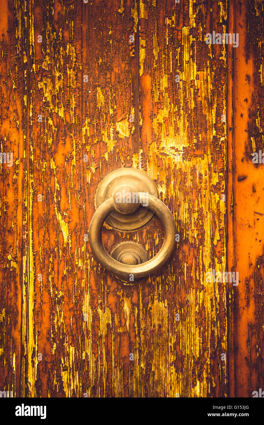 door handle yellow wood Stock Photo - Alamy