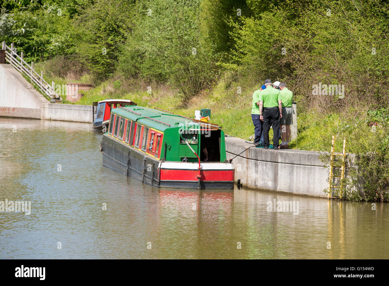 Men standing in boat hi-res stock photography and images - Alamy