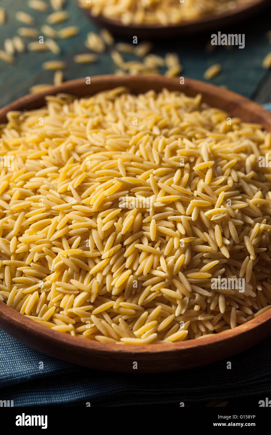 Raw Organic Orzo Pasta Ready for Cooking Stock Photo - Alamy