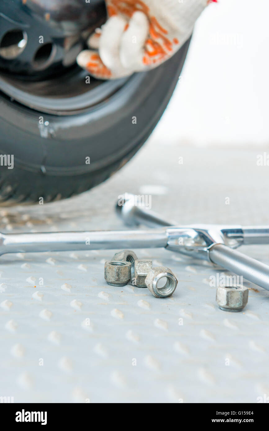 wrench and nuts close-up in a garage Stock Photo - Alamy