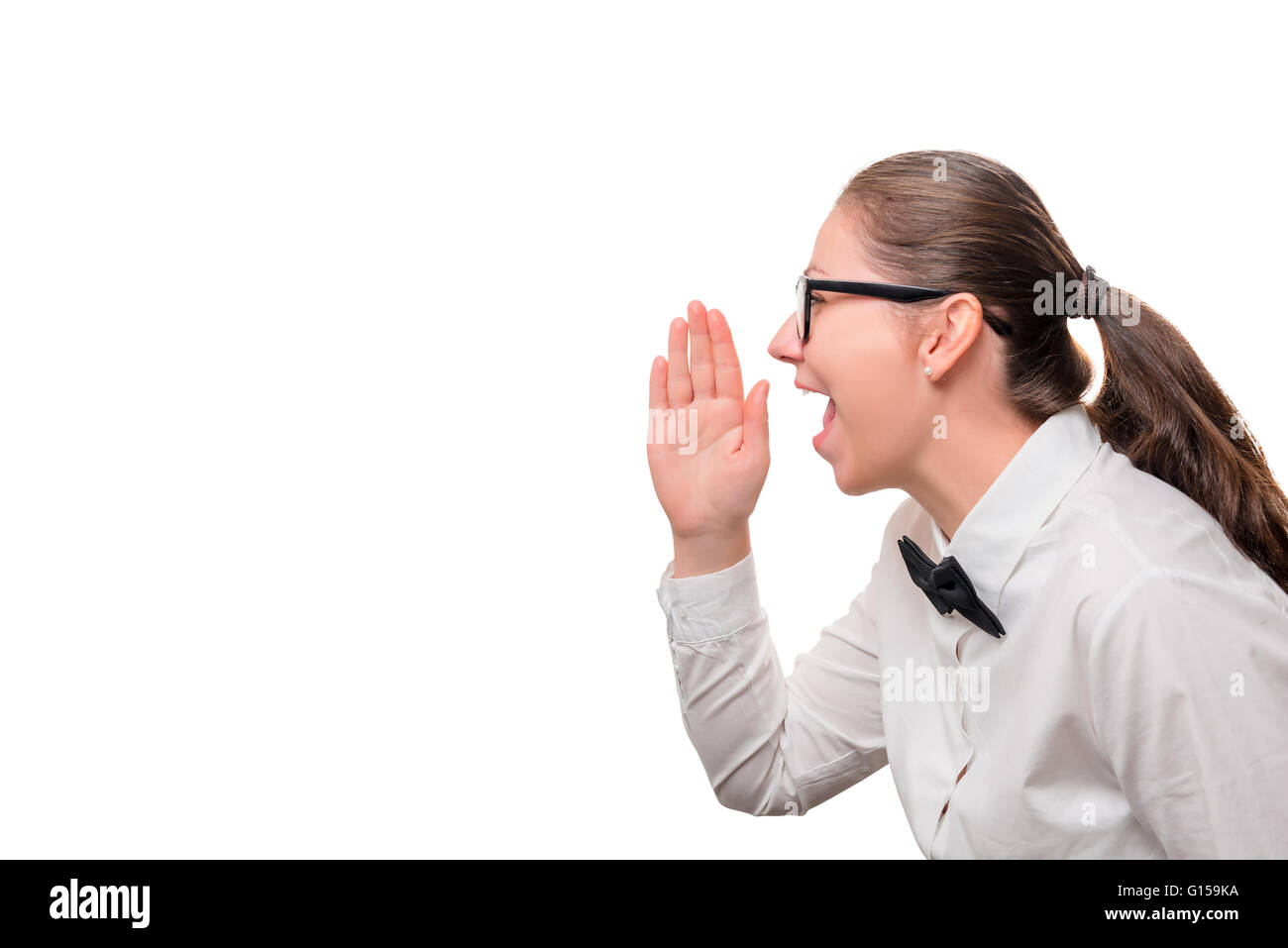 businesswoman screaming on a white background, to the left a place for ...