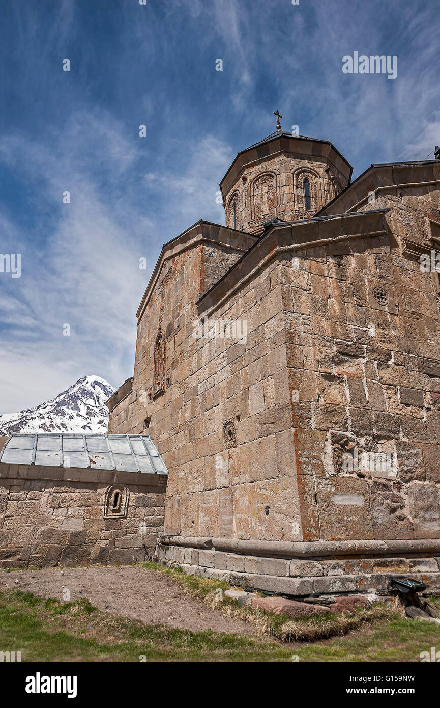 Georgia . Stepantsminda village . Gergeti Sameba Orthodox church on a ...