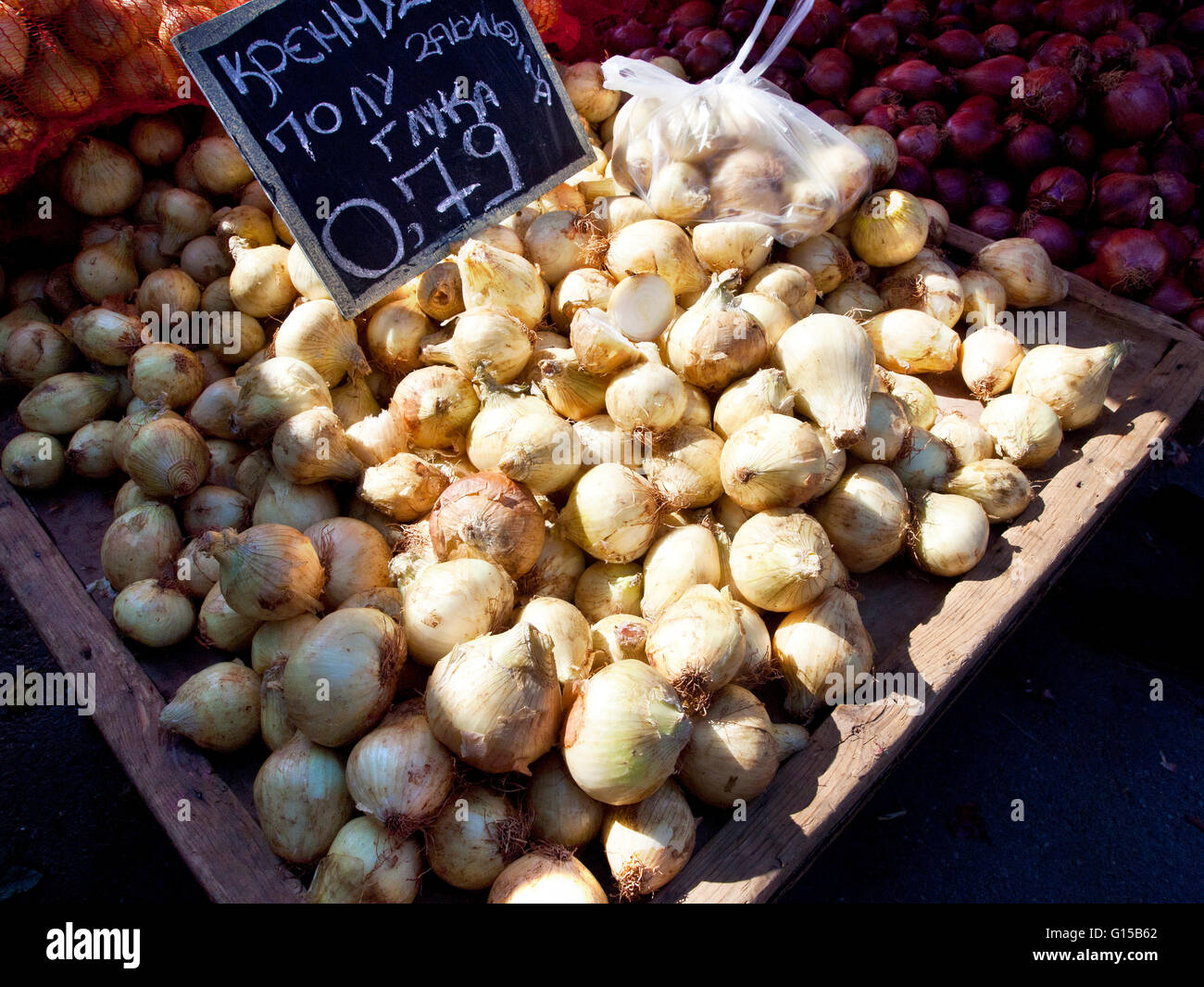 red and white onions on a stall at a Greek street market Stock Photo ...