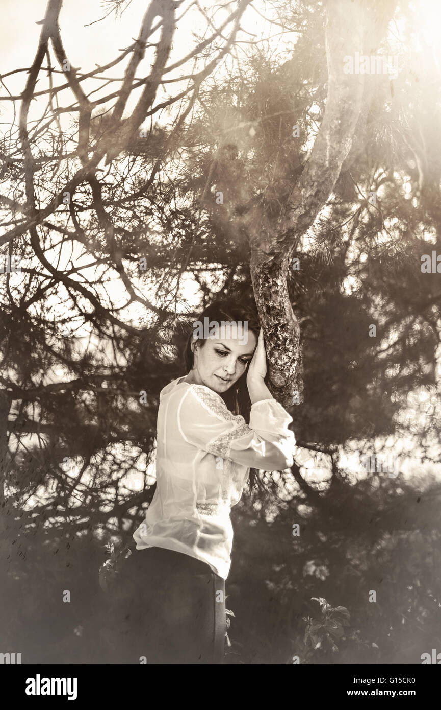 Holding on to tree hi-res stock photography and images - Alamy