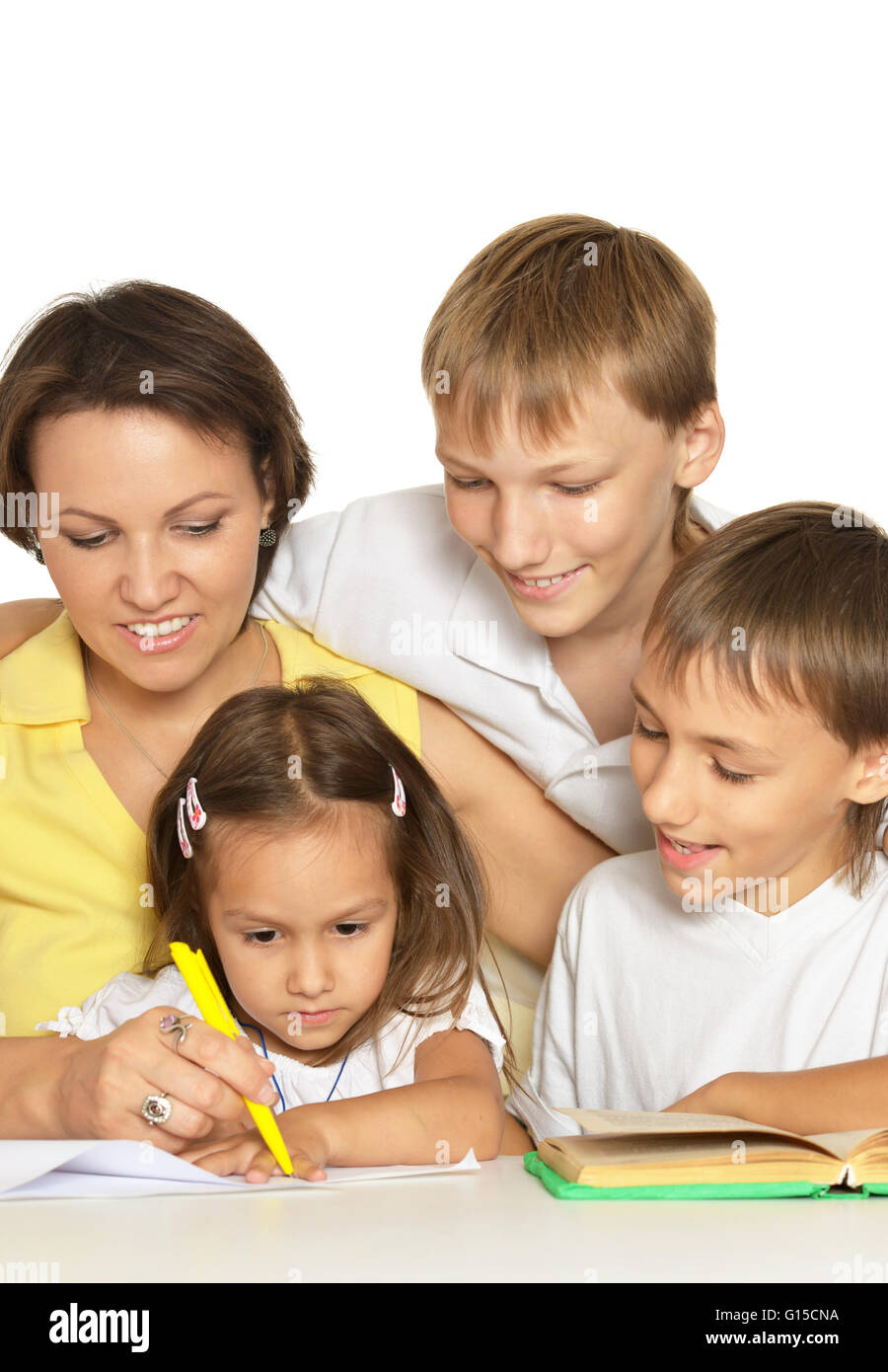 Mother doing homework Stock Photo - Alamy