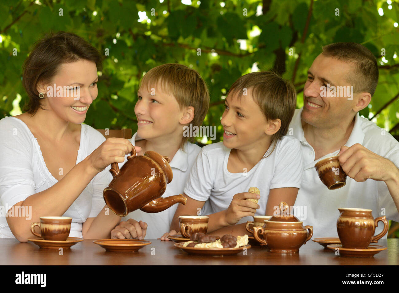 family drinking tea Stock Photo - Alamy