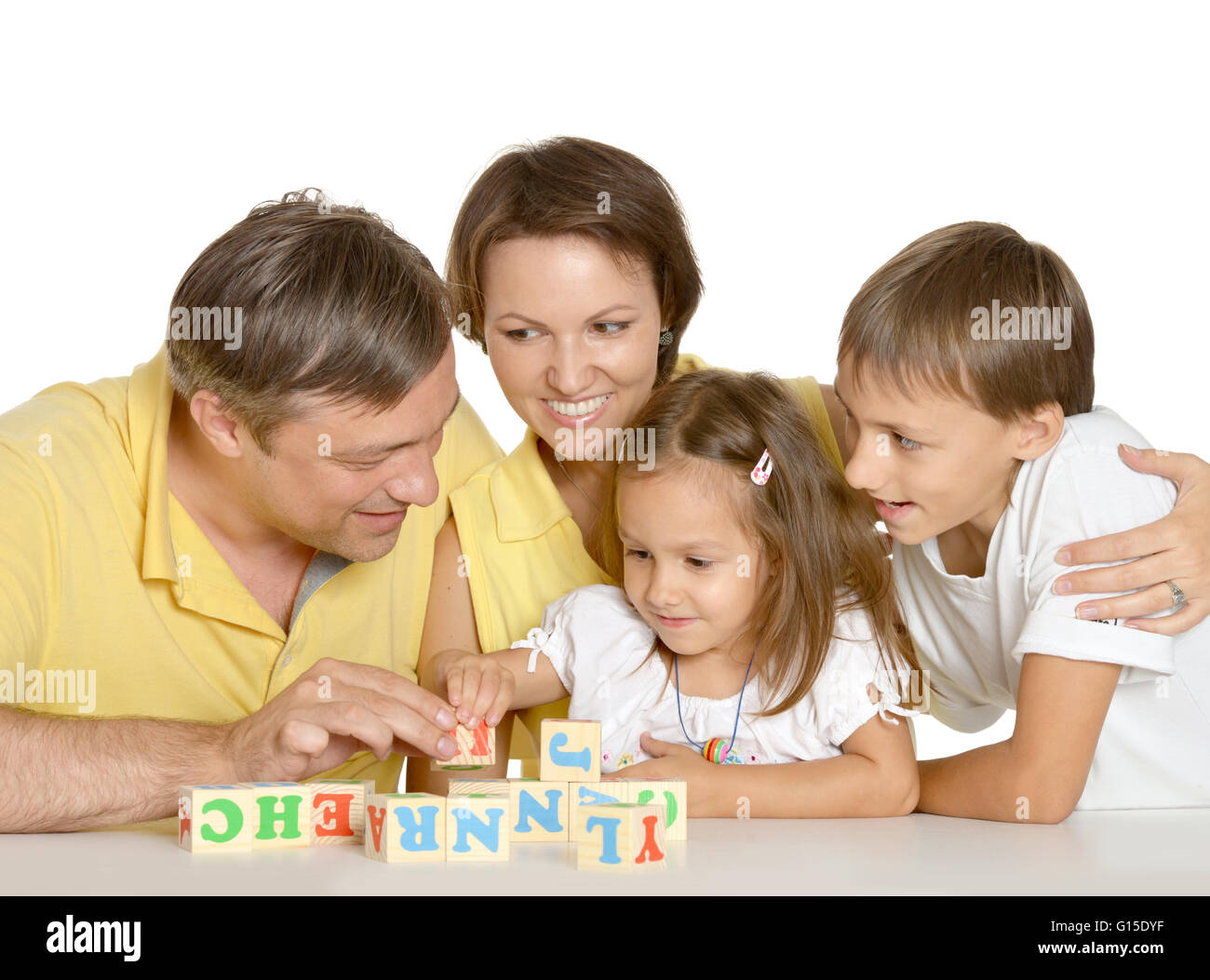 Family playing with cubes Stock Photo - Alamy
