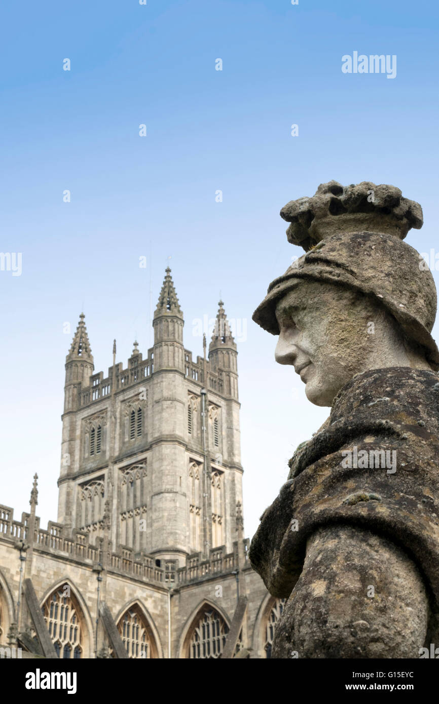Bath Abbey and a Roman statue in the Roman Baths, Bath, UNESCO World ...