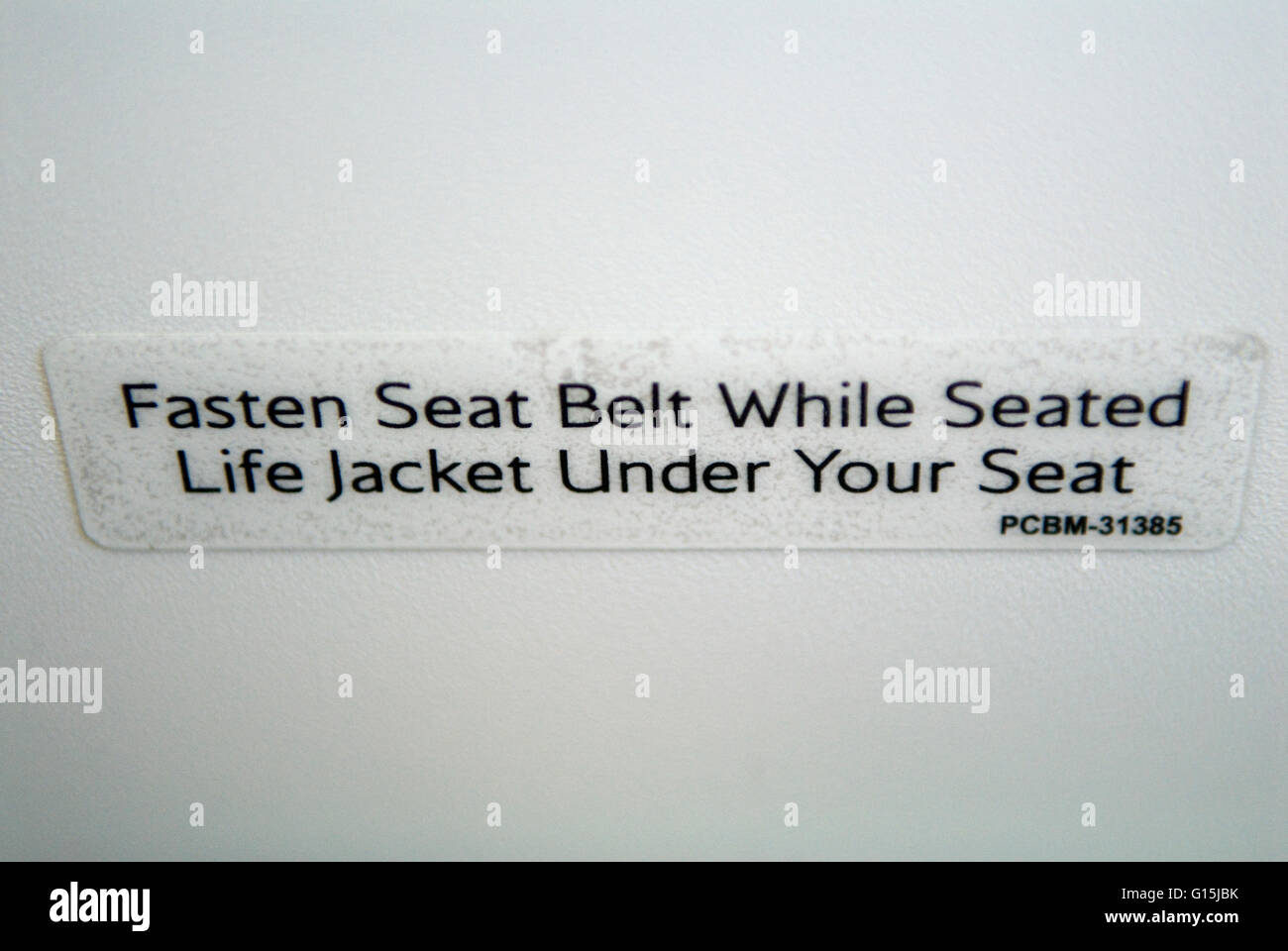 Fasten Seat Belts sign BA British Airways airplane, sign on the back of ...