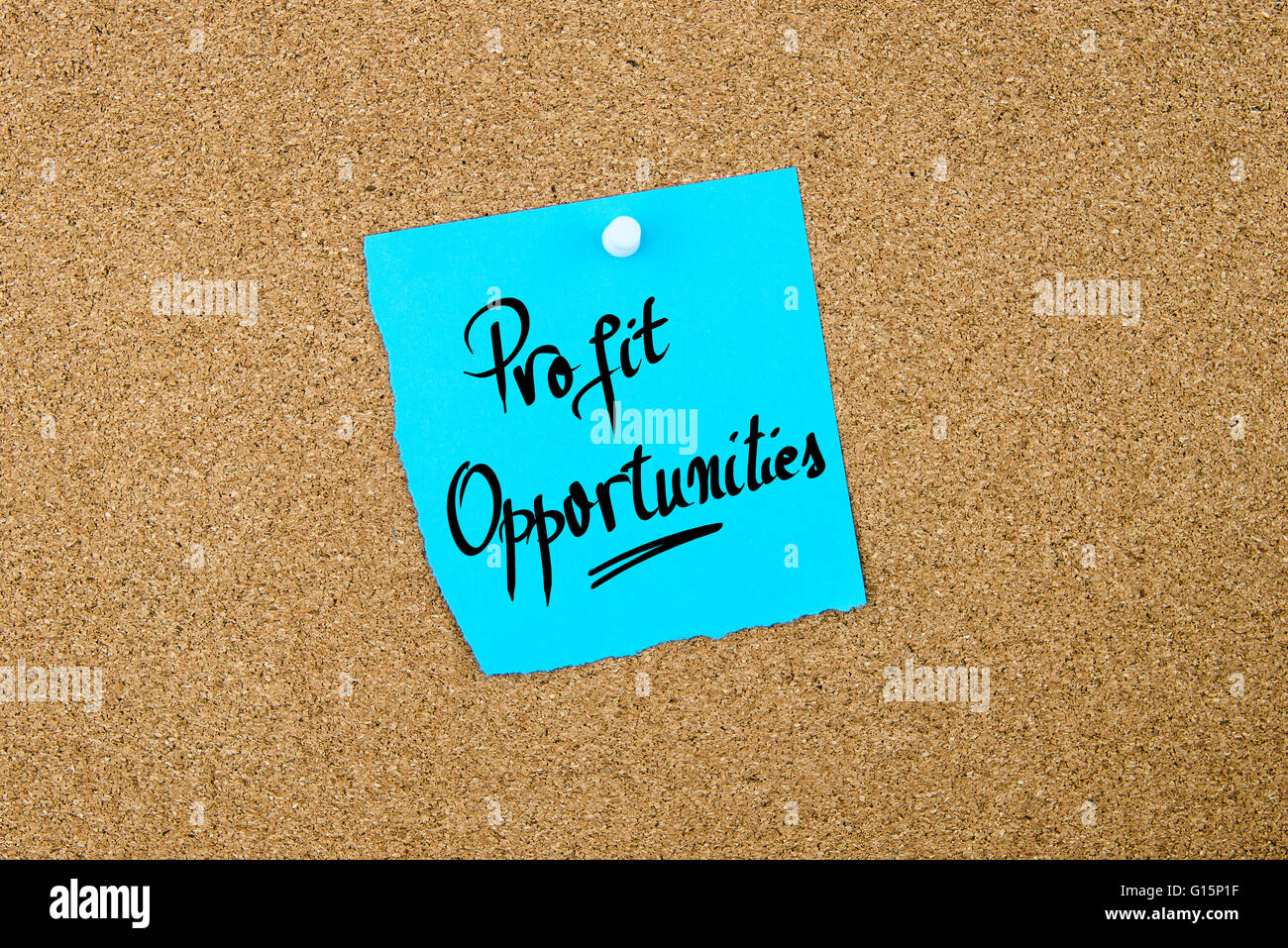 Profit Opportunities written on blue paper note pinned on cork board ...