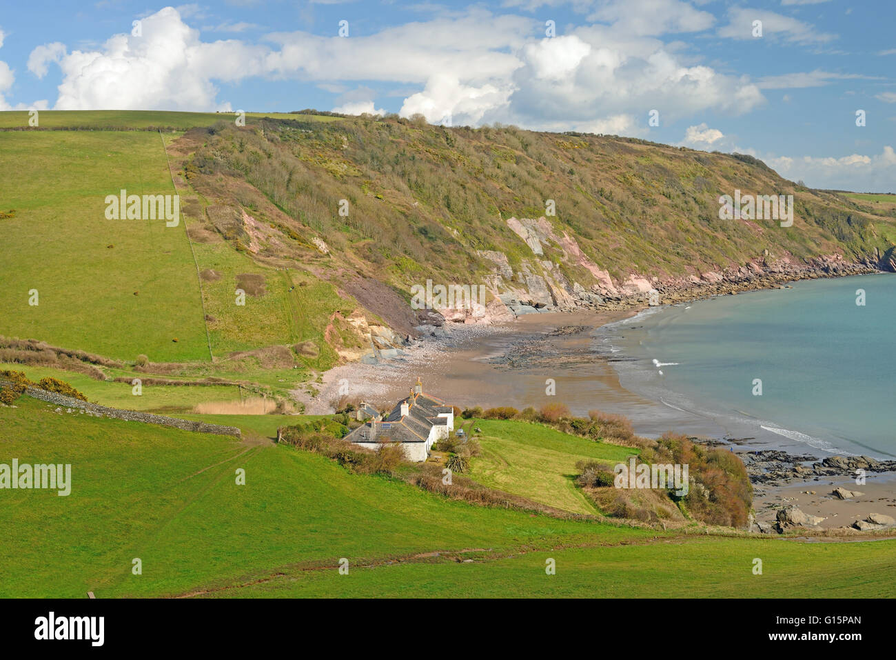Former coastguard cottages beside the beach at Man Sands, a secluded ...