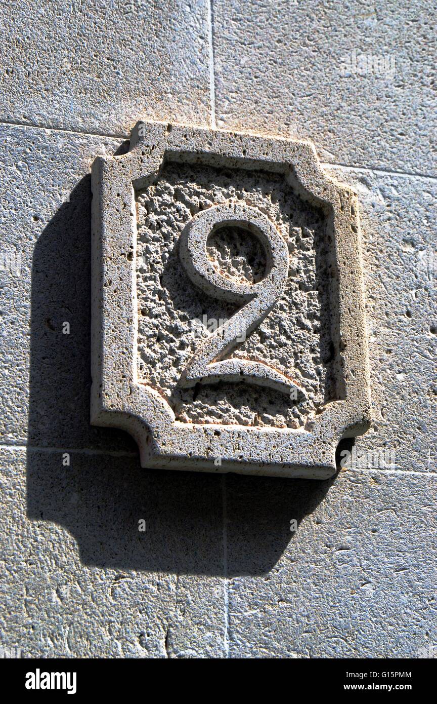 Number two to engrave in the stone blue on a facade of house Stock ...