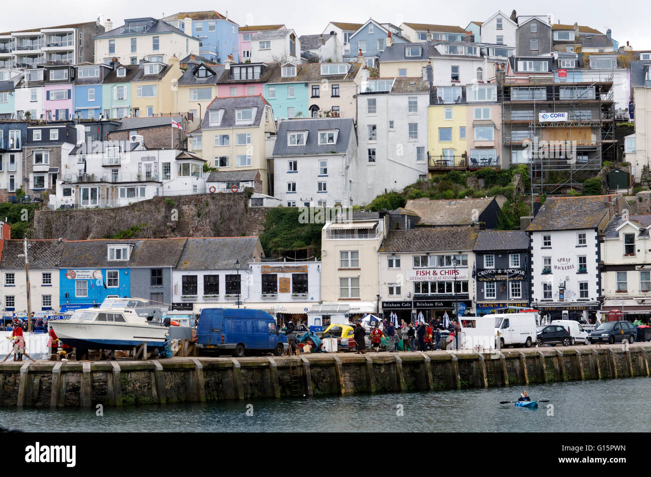 Houses on hillside besides harbour, Brixham, Devon Stock Photo - Alamy