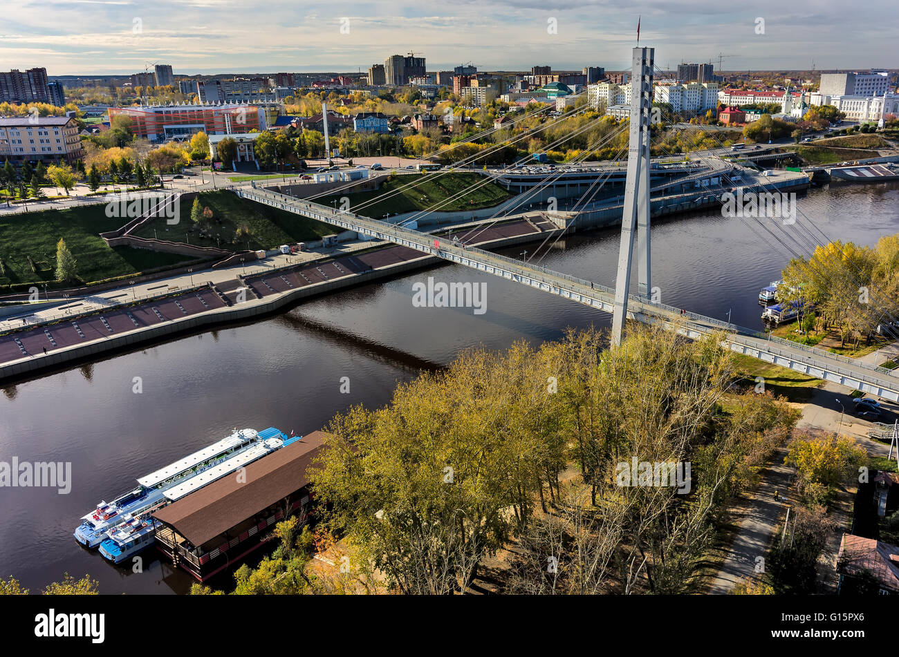 Pedestrian Lovers Bridge on Tura river. Tyumen Stock Photo - Alamy