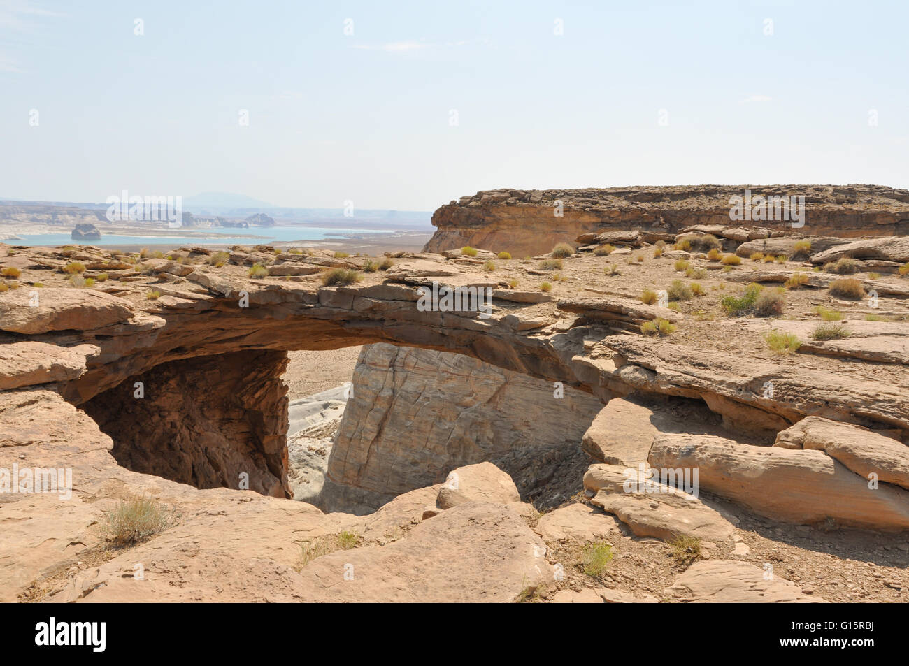 stone arch with Lake Powell in background Stock Photo - Alamy
