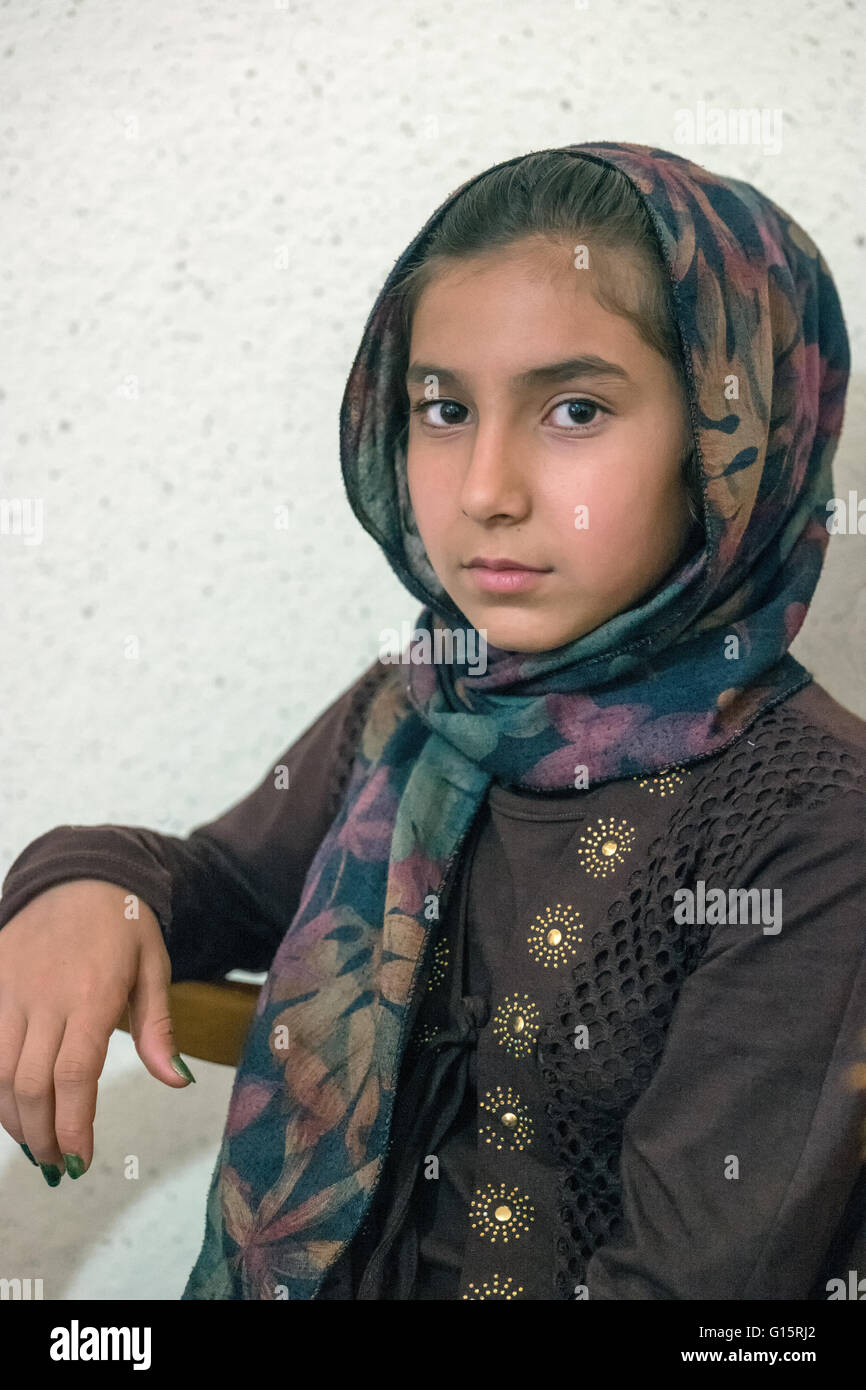Fatima Sadat, Iranian girl, age 12, wearing a hijab in her rural home ...