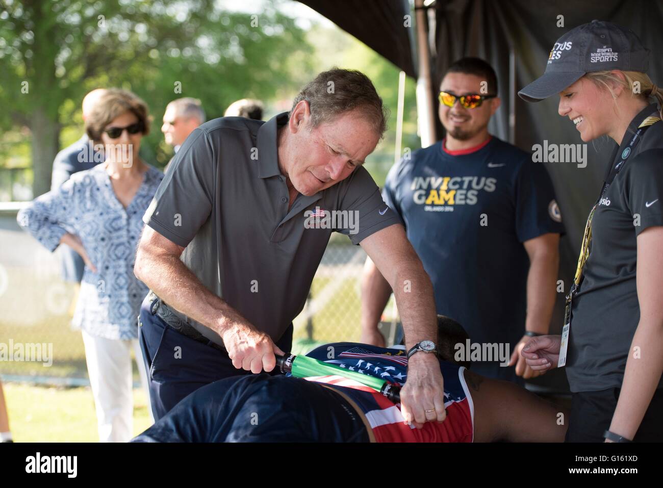 Former President George W. Bush helps athlete Marine Corps veteran Alex ...
