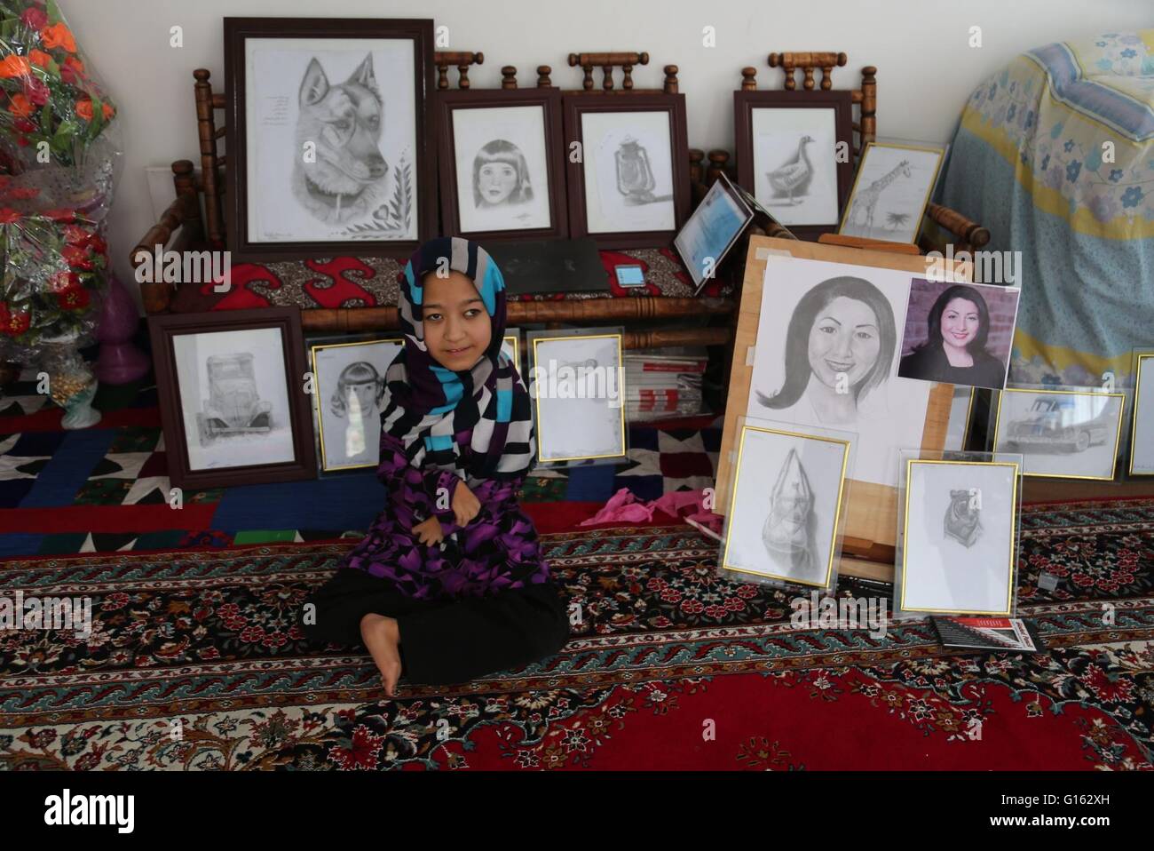 Kabul, Afghanistan. 3rd May, 2016. Rababa poses in front of her ...