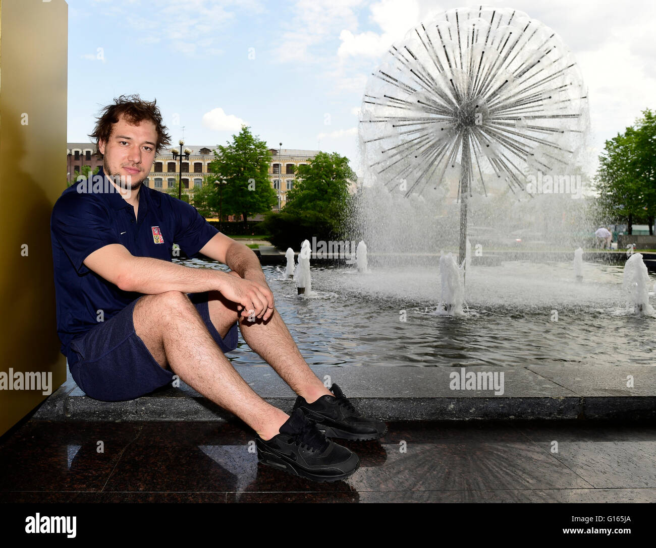 Czech hockey player Jan Kovar poses for photographer front of Crowne ...