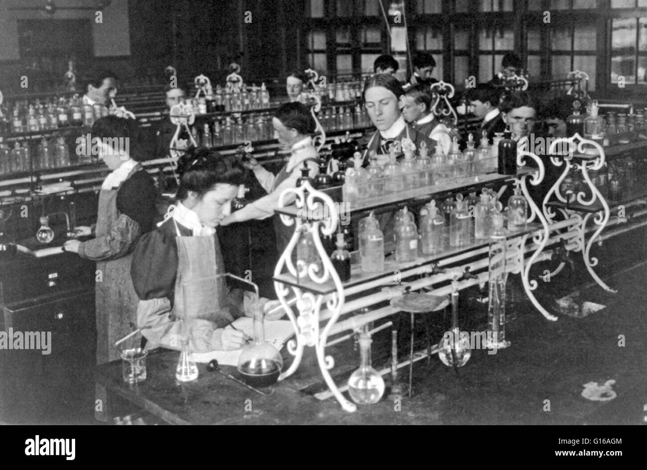 Students in a chemistry class conducting an experiment, Western High ...