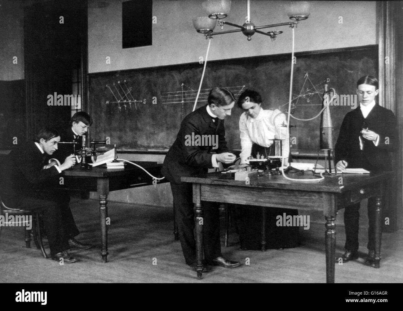 Students in a science class conducting experiments, Western High School ...