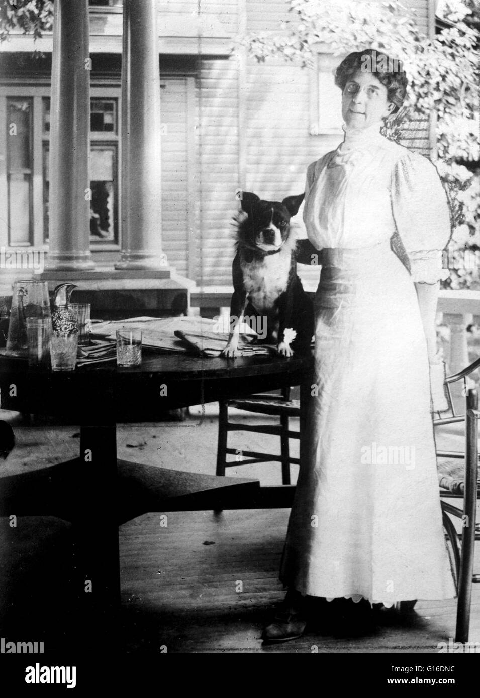 Mrs. W.G. Harding with dog "Hub" who is sitting on table. Florence ...
