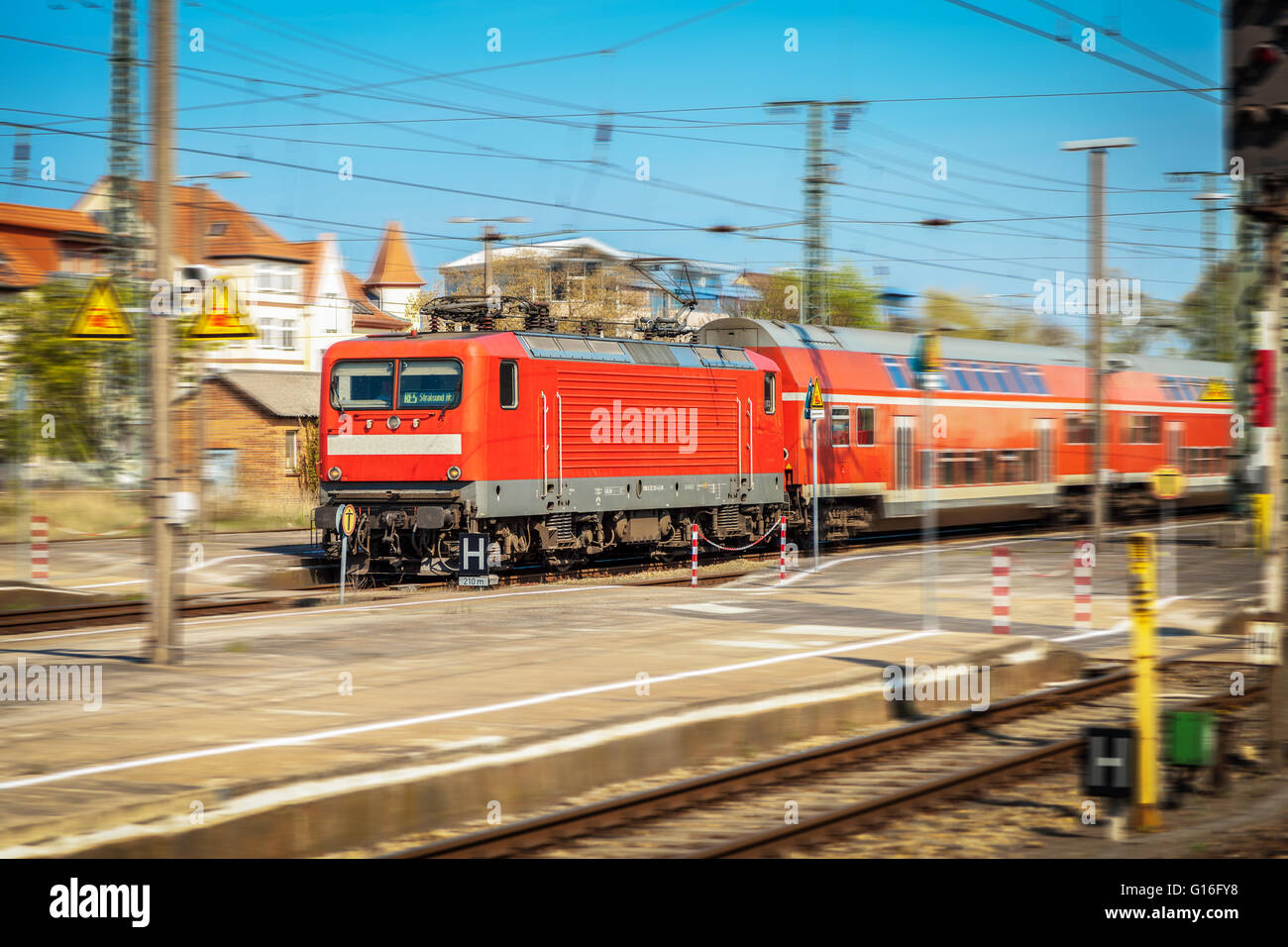 german regional express arrives on the train station Stock Photo - Alamy