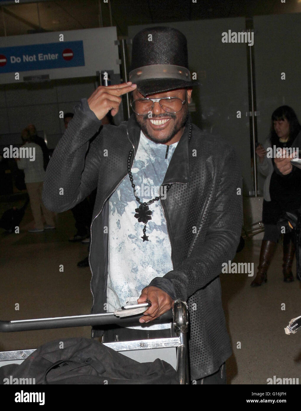 apl.de.ap of The Black Eyed Peas arrives at Los Angeles International ...