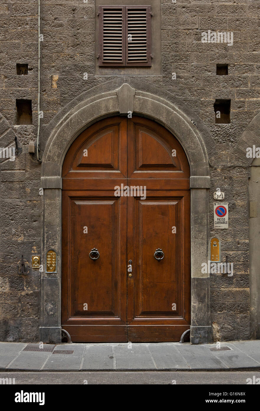 Old door in a italian street Stock Photo - Alamy