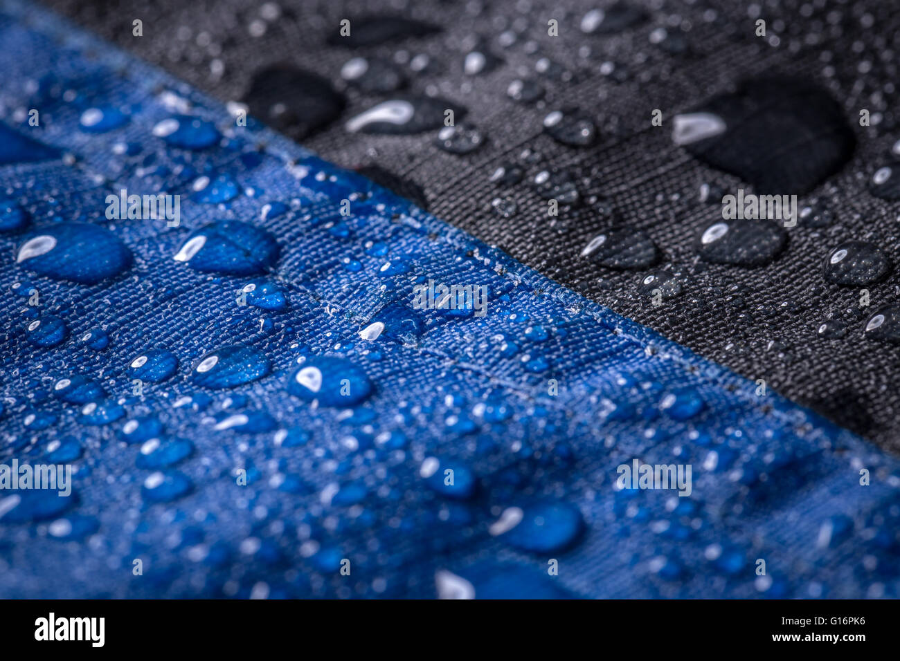 Waterproof coating background with water drops Stock Photo - Alamy