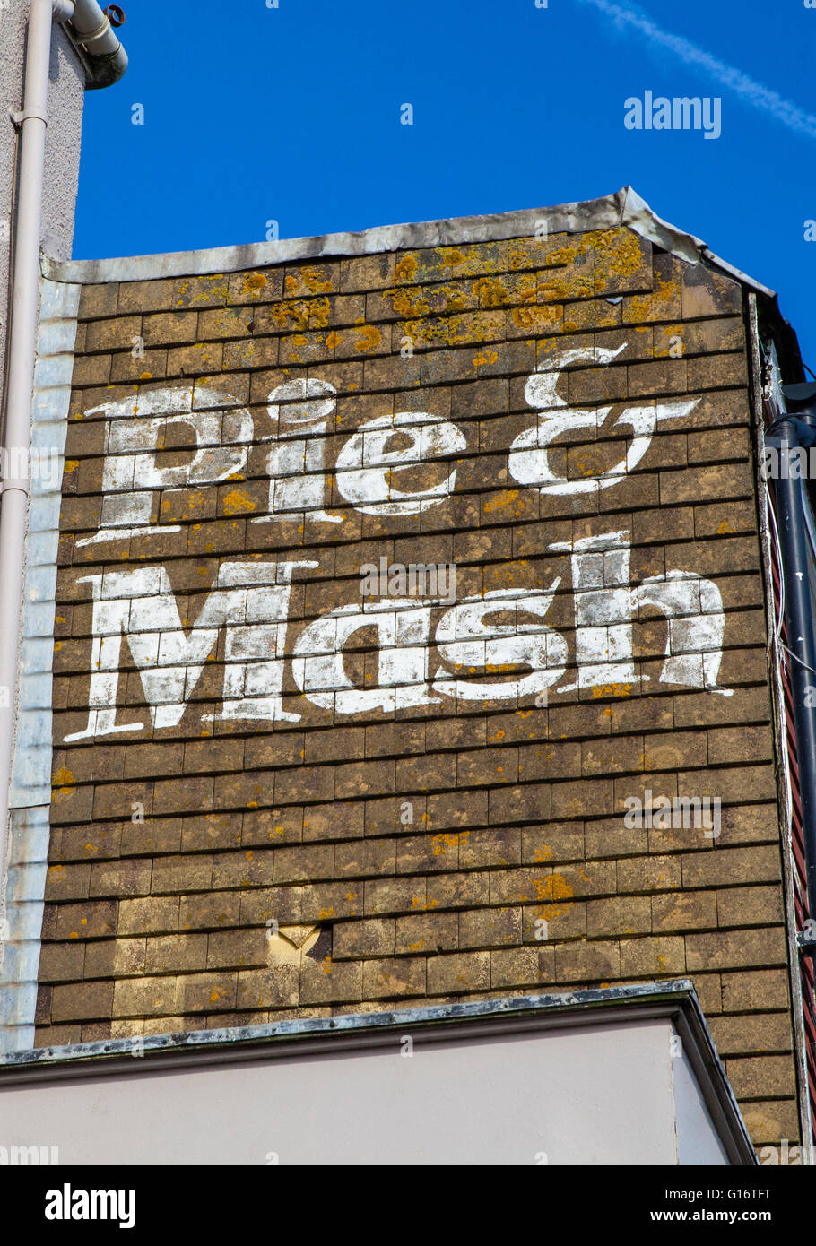An old-fashioned painted sign for a Pie and Mash shop in England Stock ...