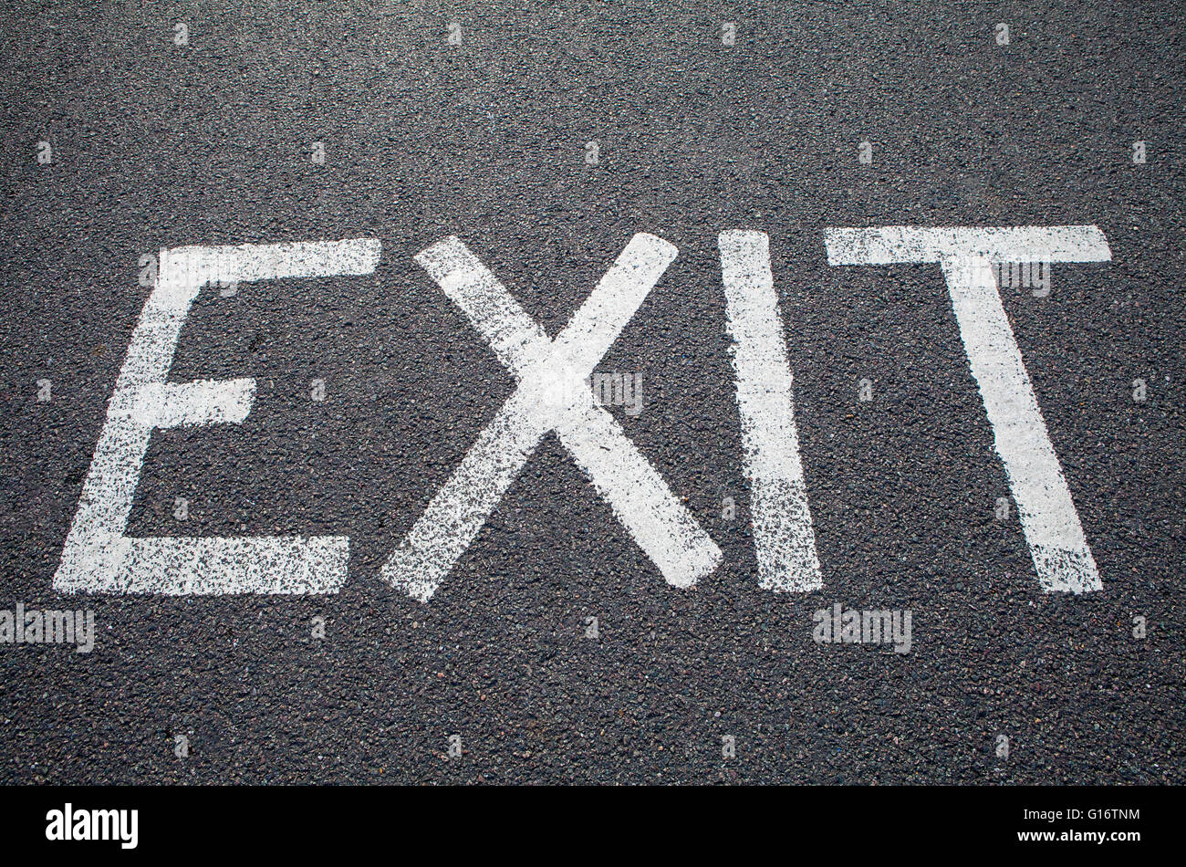 An EXIT marking on a road Stock Photo - Alamy