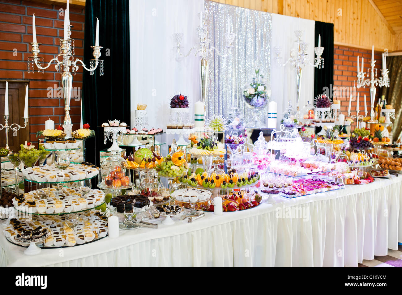 Elegance wedding reception table with food and decor Stock Photo - Alamy
