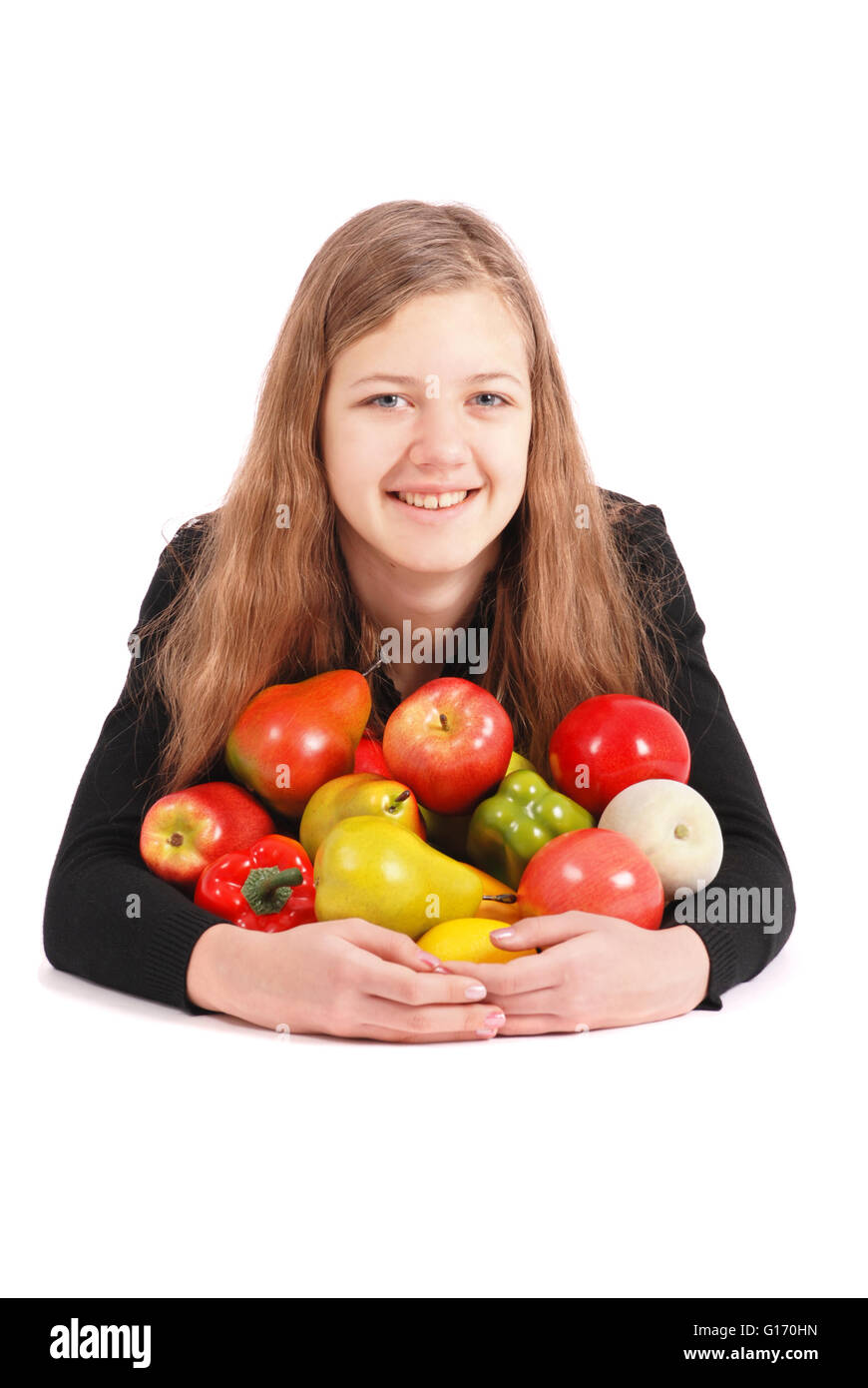 Girl holding fresh fruits isolated on white Stock Photo - Alamy