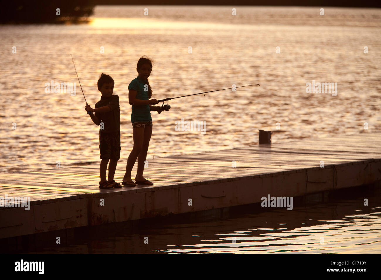 Hawaii children fishing hi-res stock photography and images - Alamy