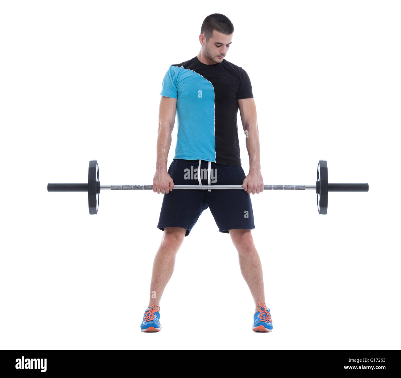 Fitness trainer doing an exercise with olympic barbell. Image isolated ...