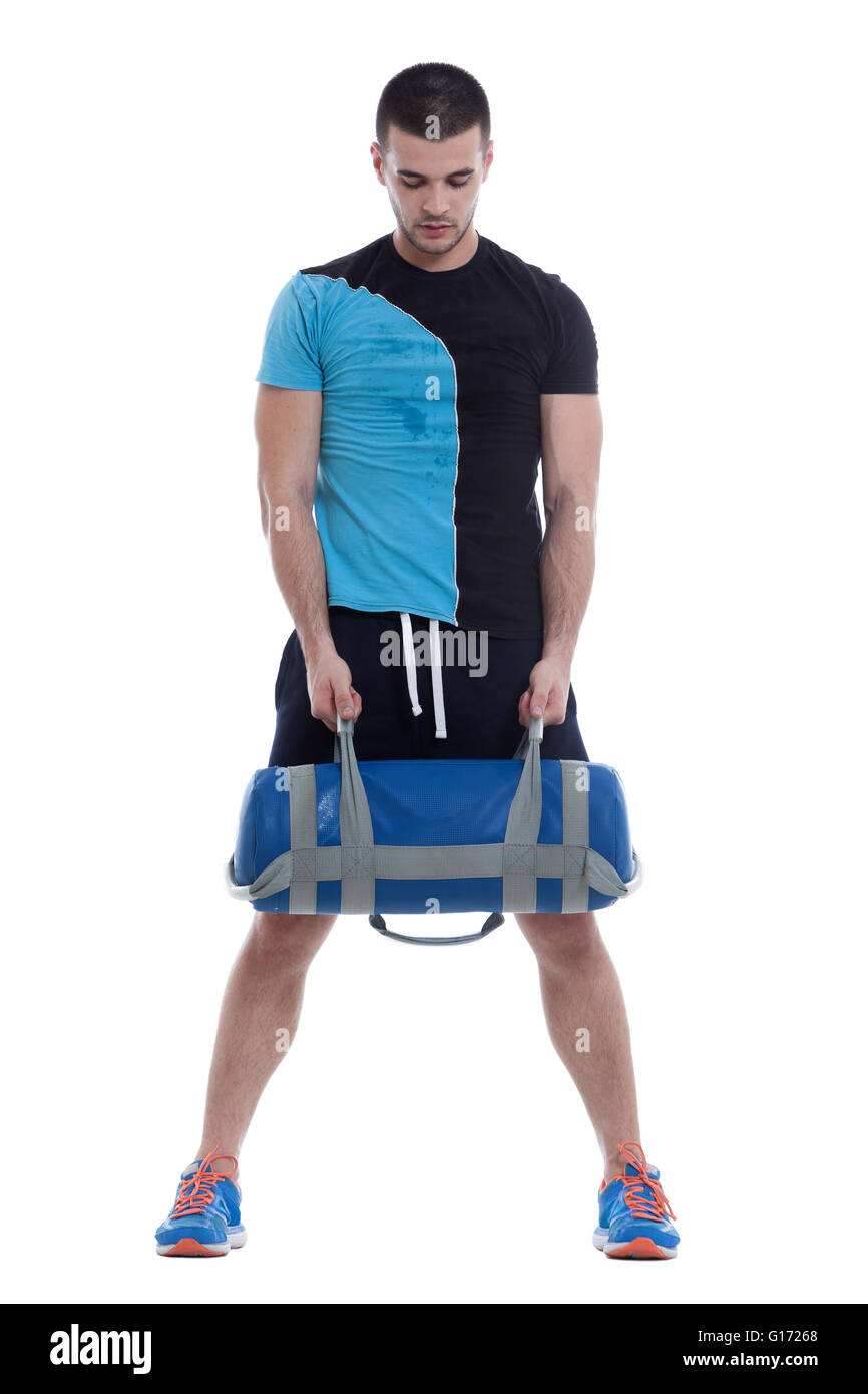 Fitness trainer doing a demonstration of core bag exercise. Image ...