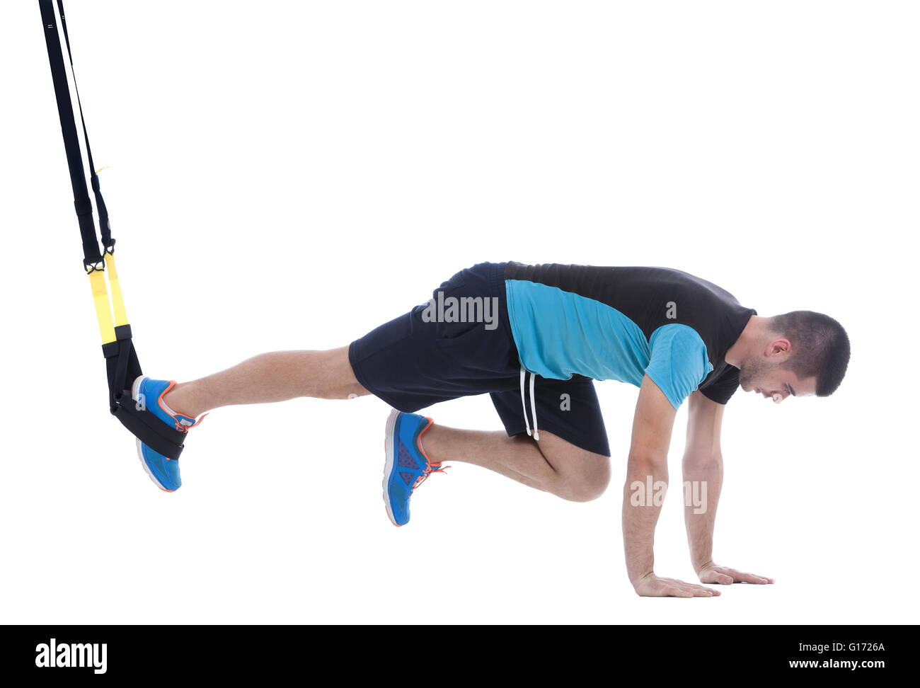 Athletic trainer on functional loops for training isolated on white ...