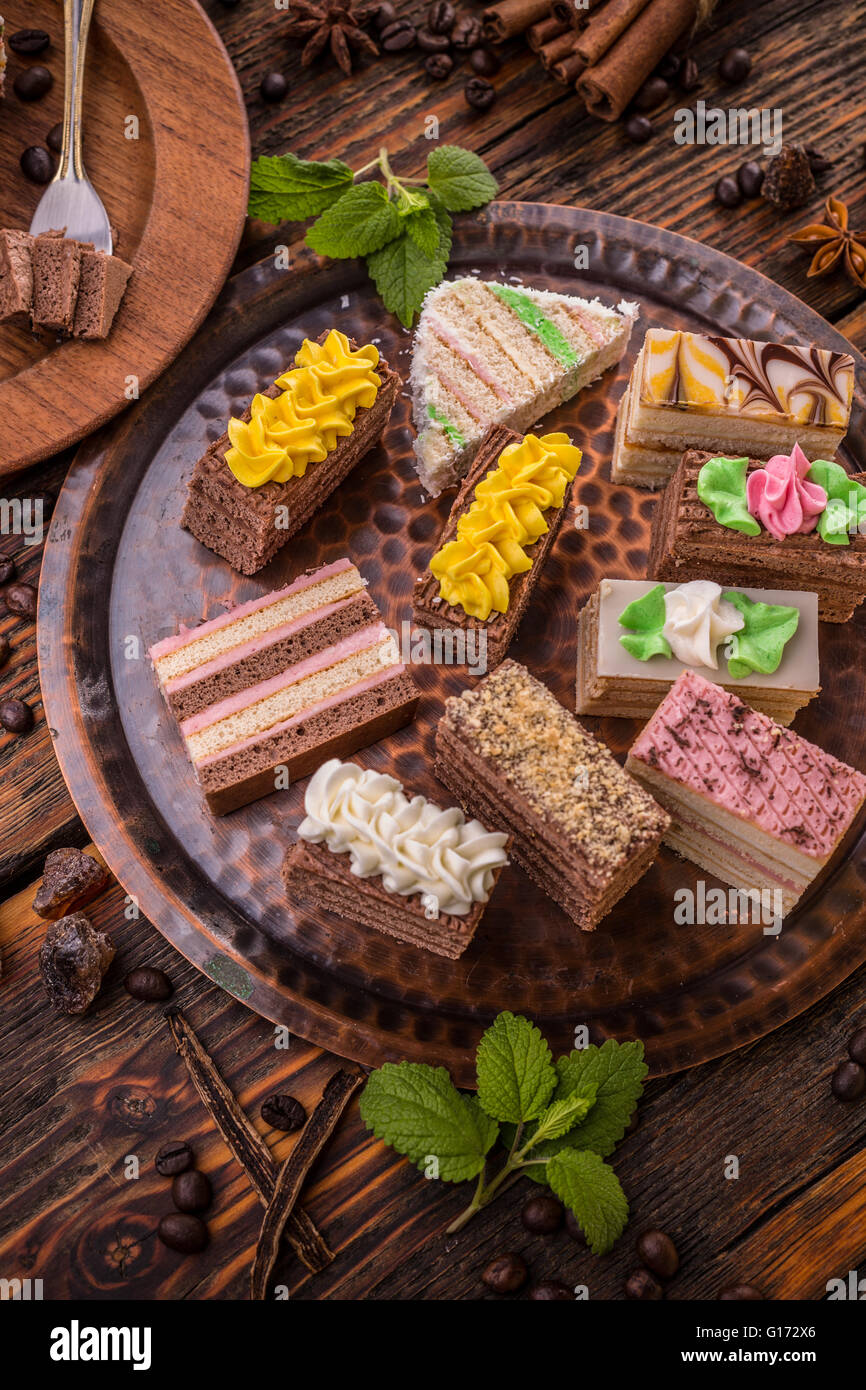 Different sort of beautiful layered pastries Stock Photo - Alamy