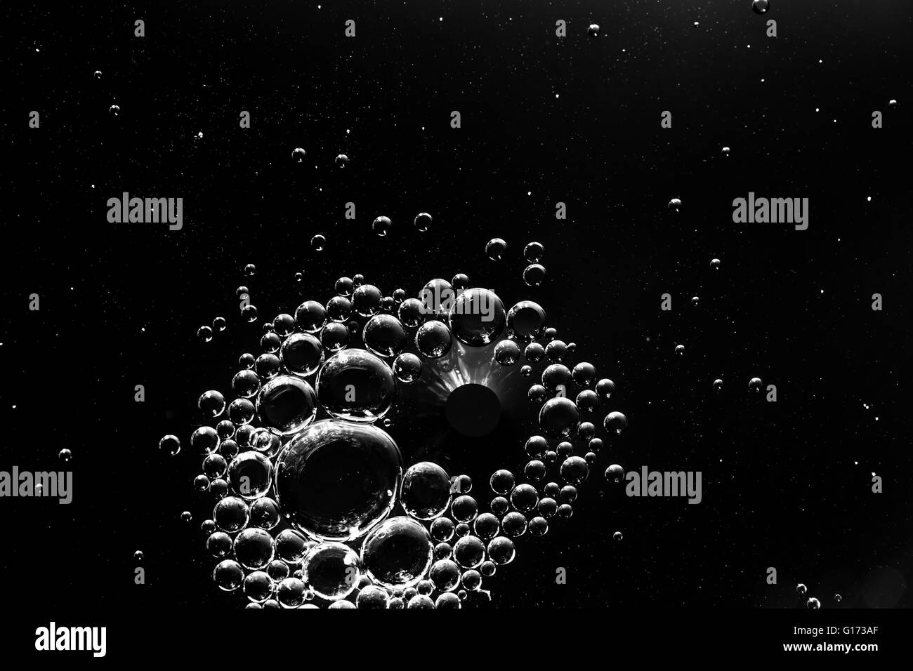 Oil drop in water Black and White Stock Photos & Images - Alamy