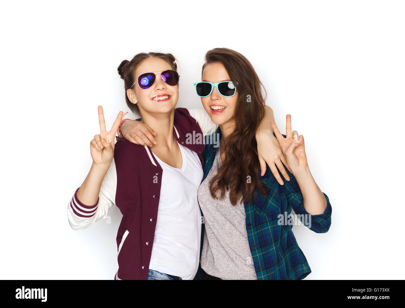 smiling teenage girls in sunglasses showing peace Stock Photo - Alamy