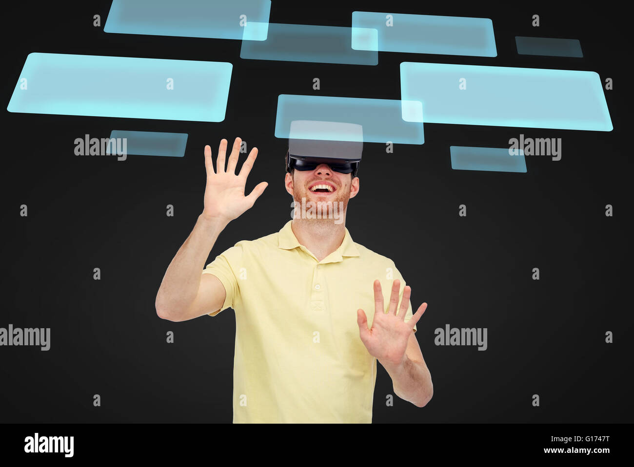 happy man in virtual reality headset or 3d glasses Stock Photo - Alamy