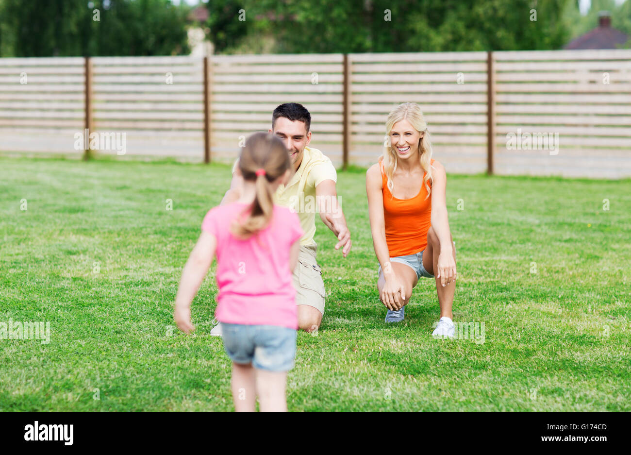 happy family playing outdoors Stock Photo - Alamy