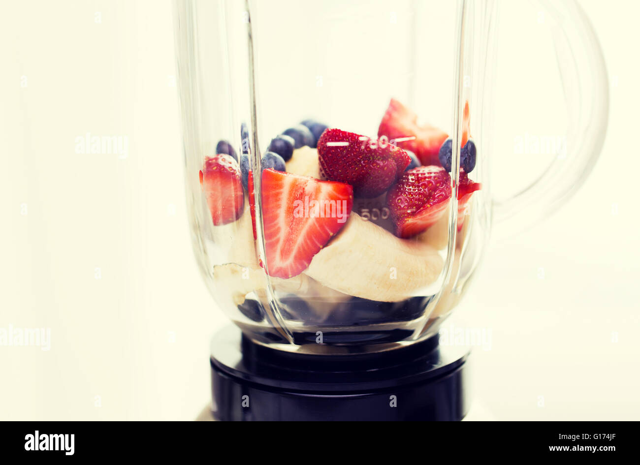 close up of blender shaker with fruits and berries Stock Photo - Alamy