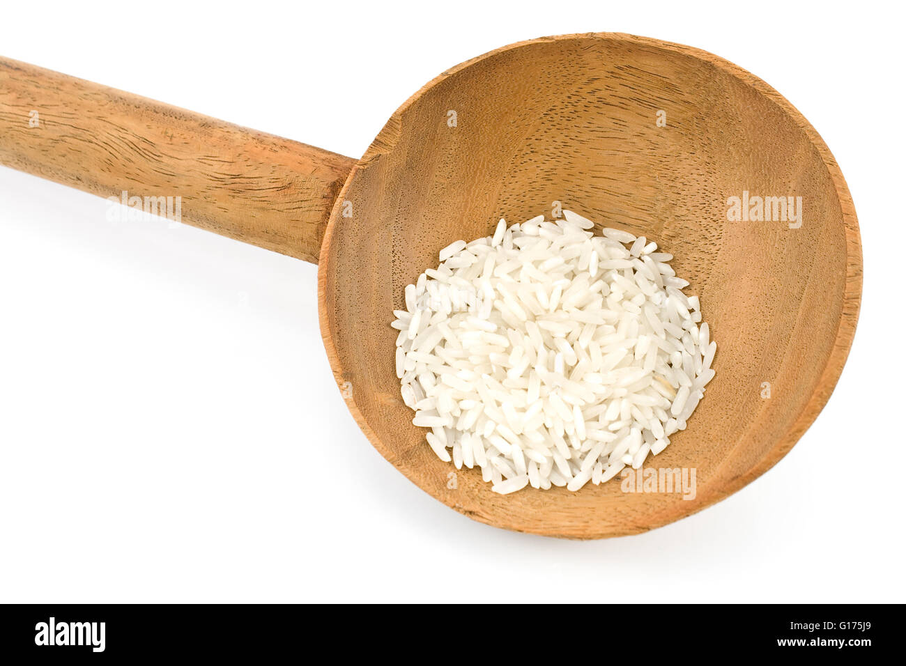 Large wooden spoon with rice isolated on white Stock Photo - Alamy