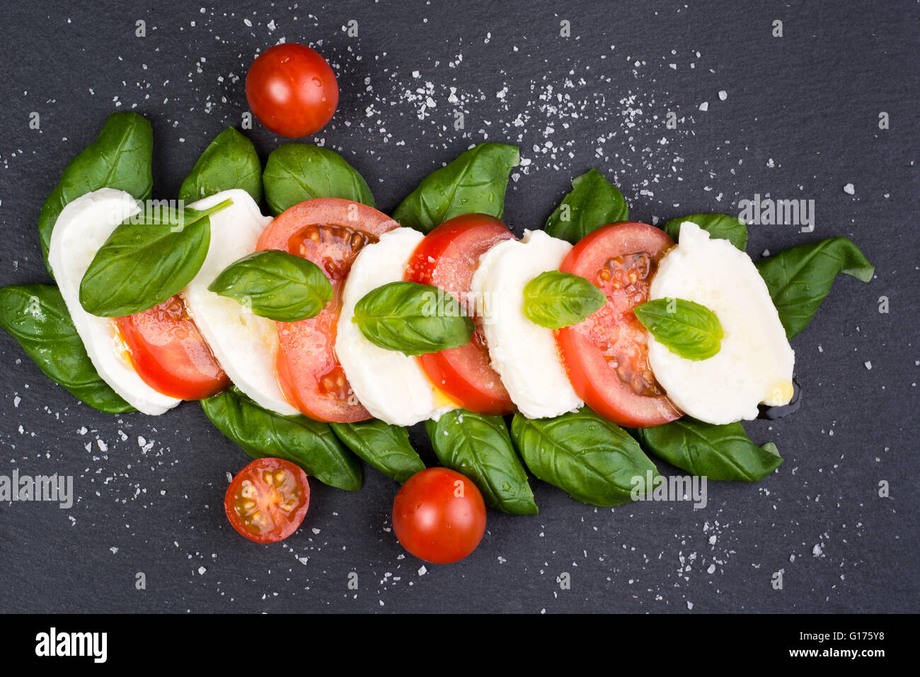Top view of fresh italian caprese salad with tomatoes, mozzarella ...